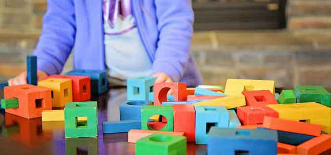 Toy Library contributes to learning for library family | Omaha Public ...